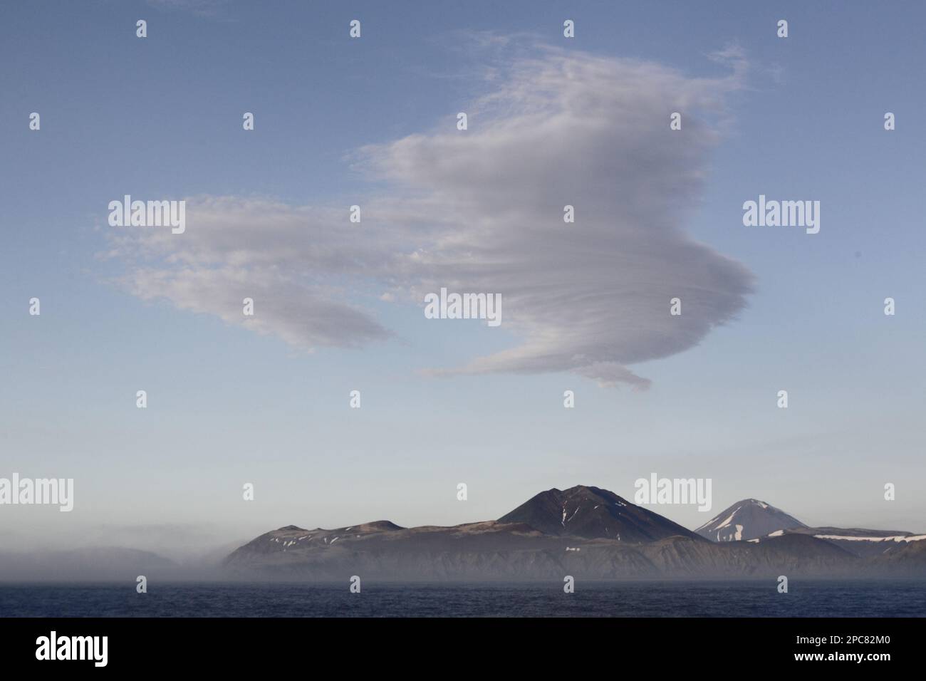 View of the volcanic island coast at dawn, Simushir Island, Kuril ...