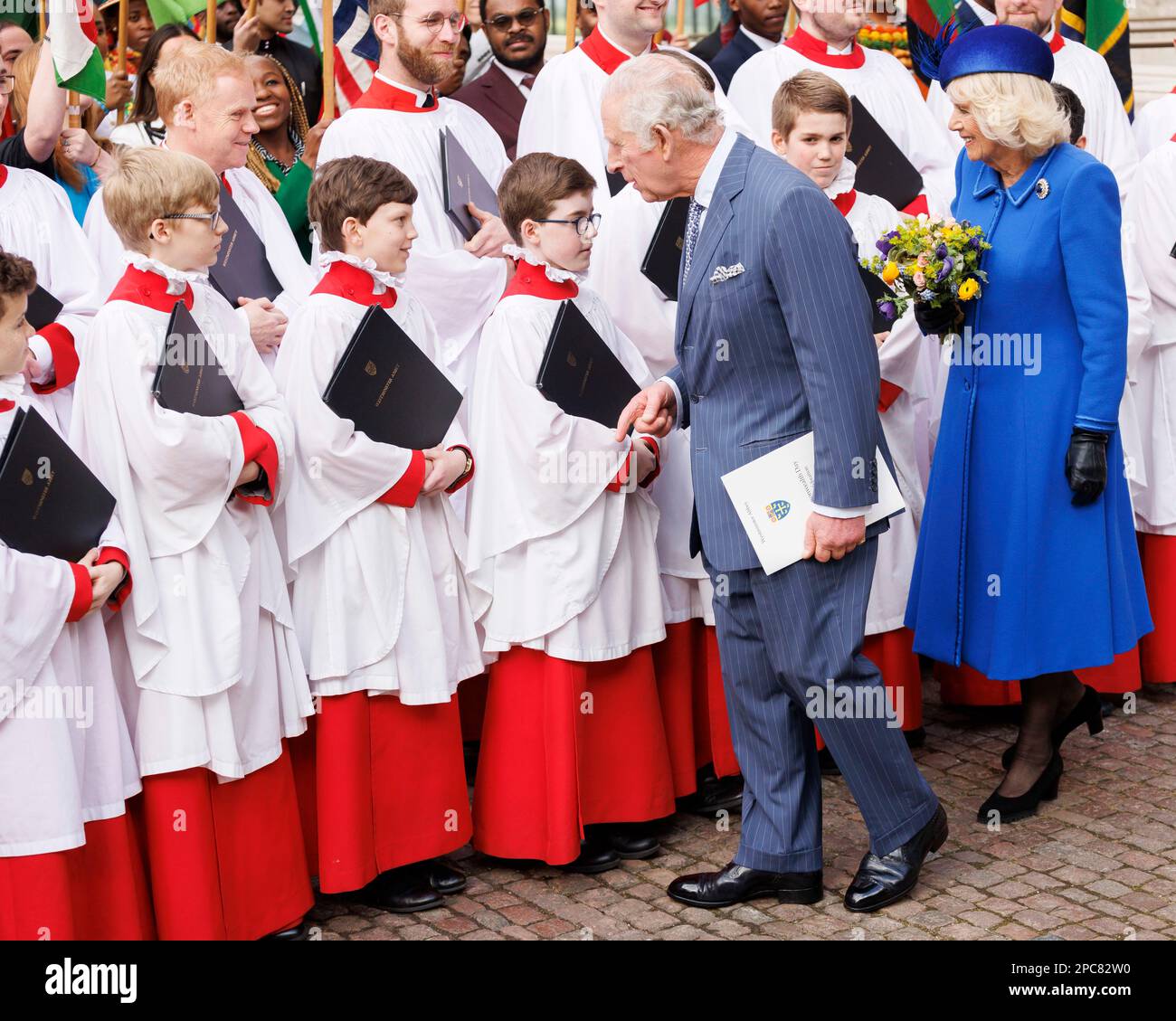 King Charles III and the Queen Consort speak to choristers as they ...