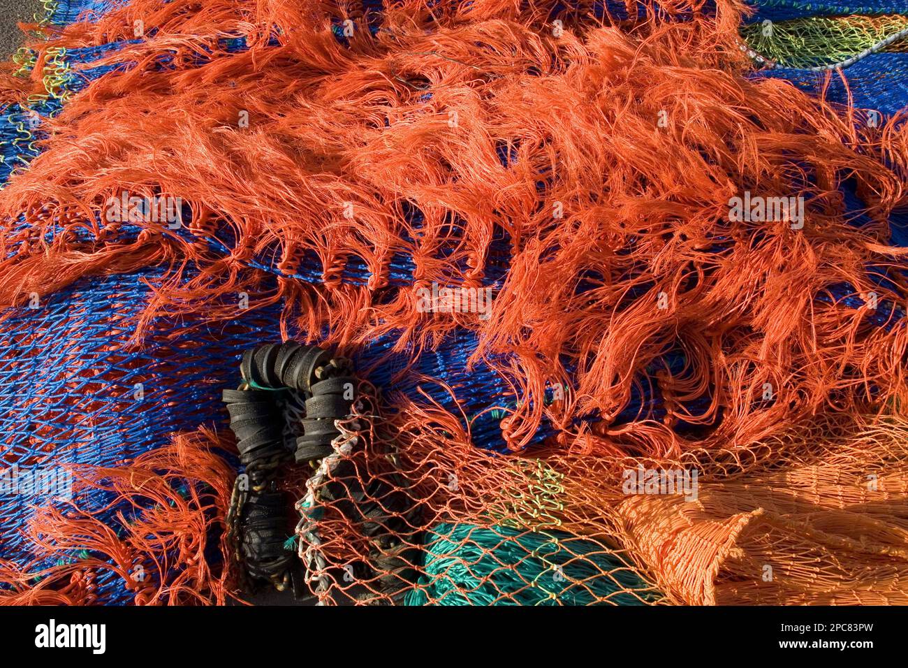 Fishing nets on the Whitstable harbour wall Stock Photo - Alamy