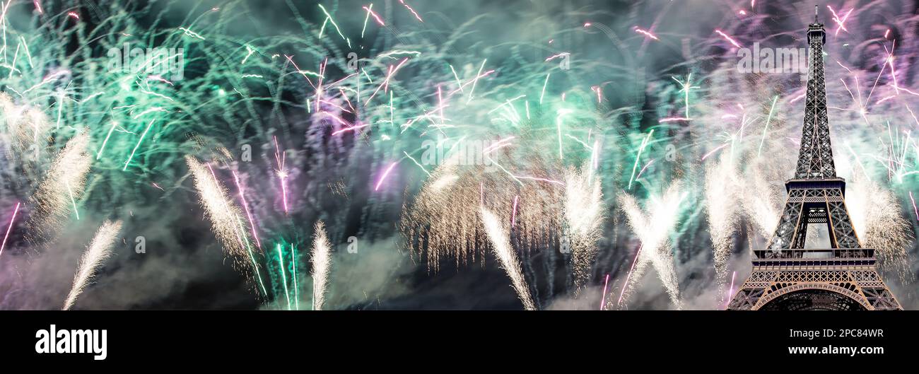 Celebratory colorful fireworks over the Eiffel Tower in Paris, France ...