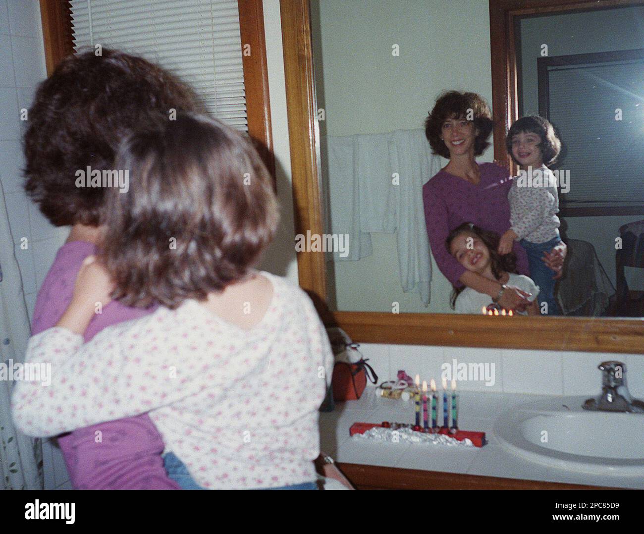 Sharon Eshel Gloster celebrates the fourth night of Hanukkah, in ...
