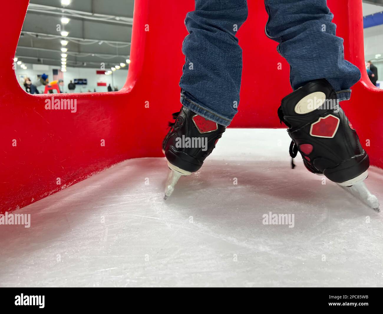 Beginner ice skater using a plastic walker for assistance Stock Photo ...