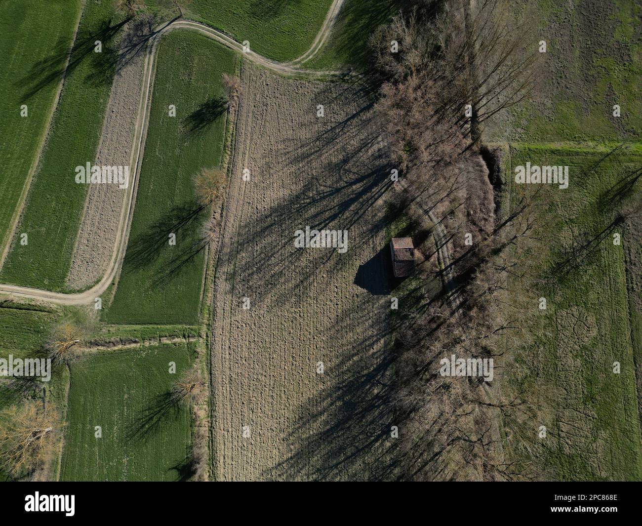 farmed fields of Borghetto di Borbera Peimonte Italy Village aerial ...
