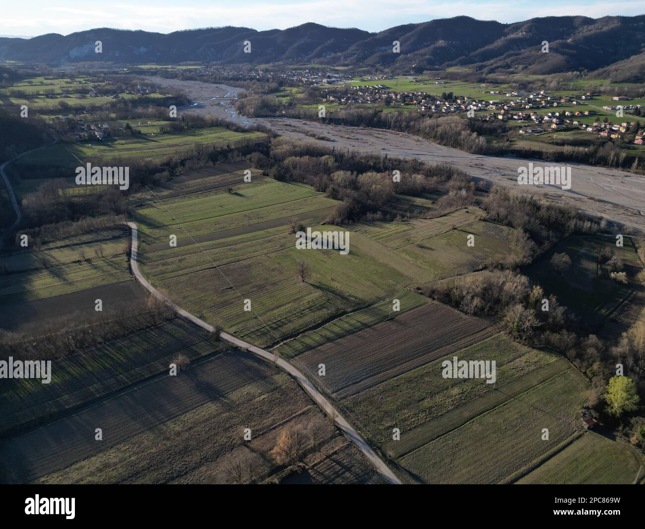 farmed fields of Borghetto di Borbera Peimonte Italy Village aerial ...