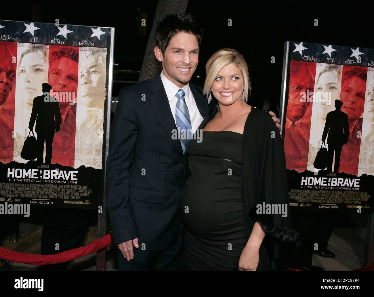 Actor Brian Presley, left, arrives with his wife, Erin, at the film ...