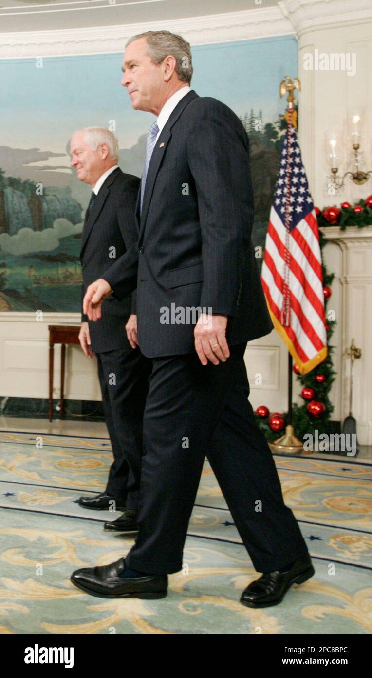 President Bush, right, walks out with Defense Secretary-designate ...