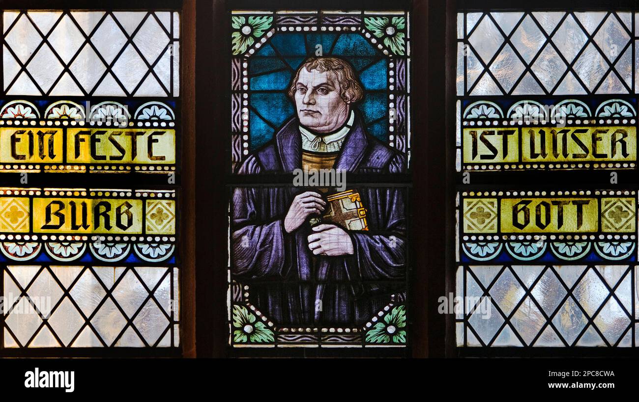 Portrait of Luther as a stained glass window with the words Eine feste ...