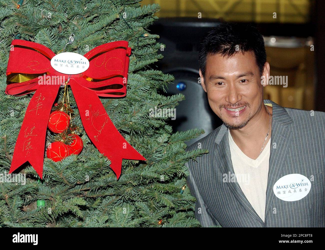 Hong Kong singer Jacky Cheung poses to celebrate the 8th anniversary of ...
