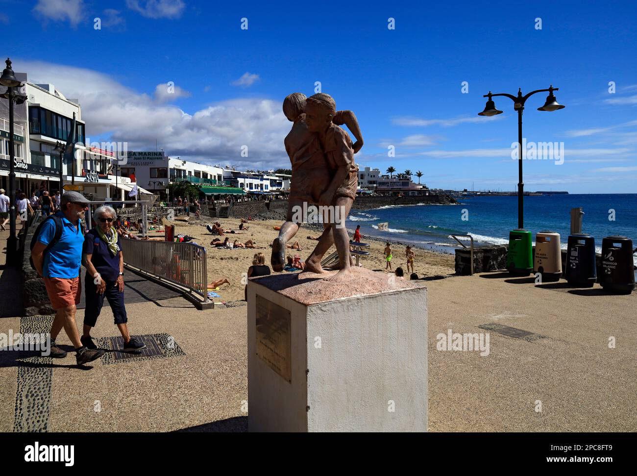 Boys wrestling in the local Lucha Canaria wrestling ,as taught locally ...
