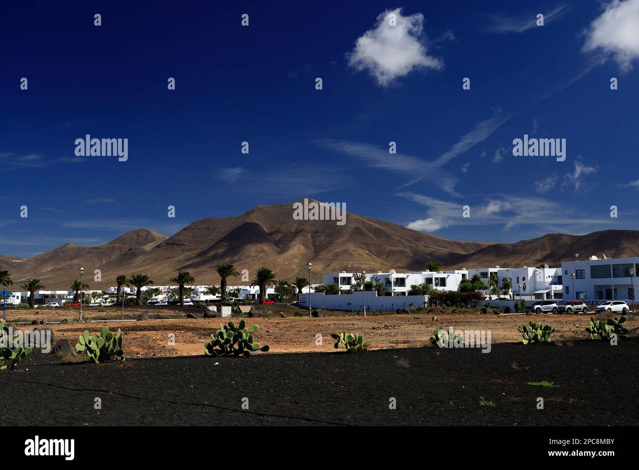 Hacha Grande and the mountains of Femes from Las Coloradas, Playa ...