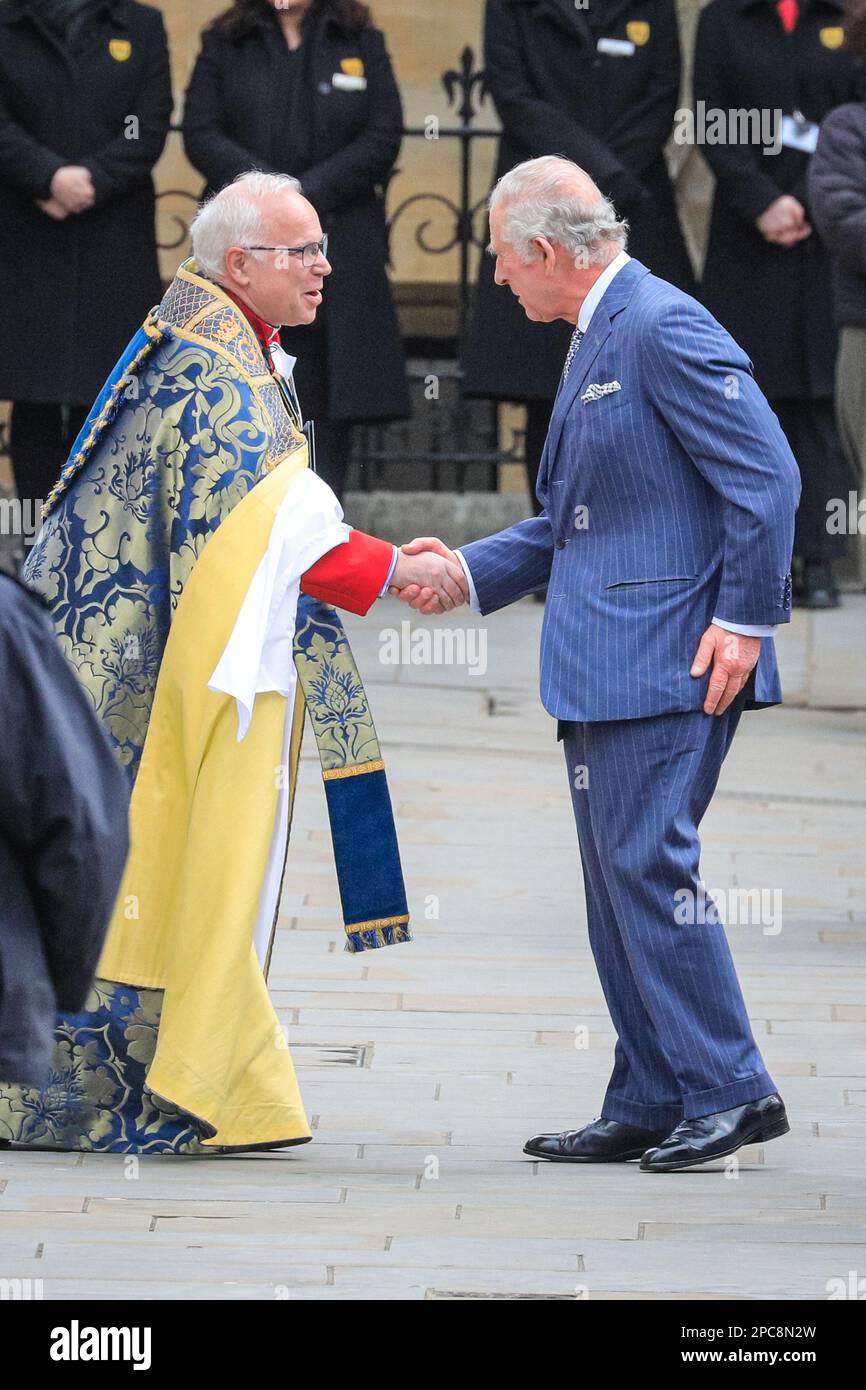 London, UK. 13th Mar, 2023. King Charles is greeted by a church ...