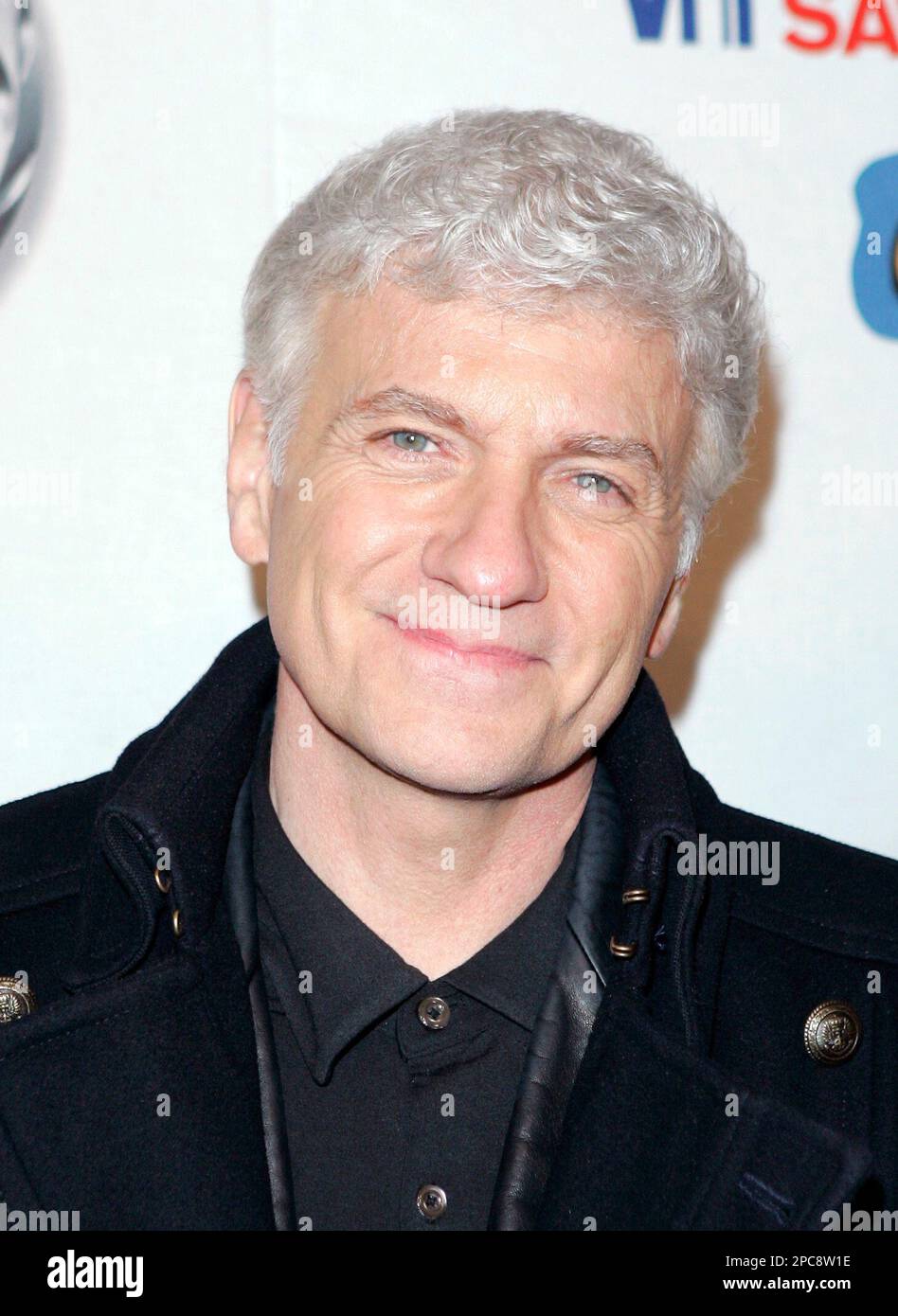 Dennis DeYoung of the rock group Styx poses as he arrives at a benefit ...