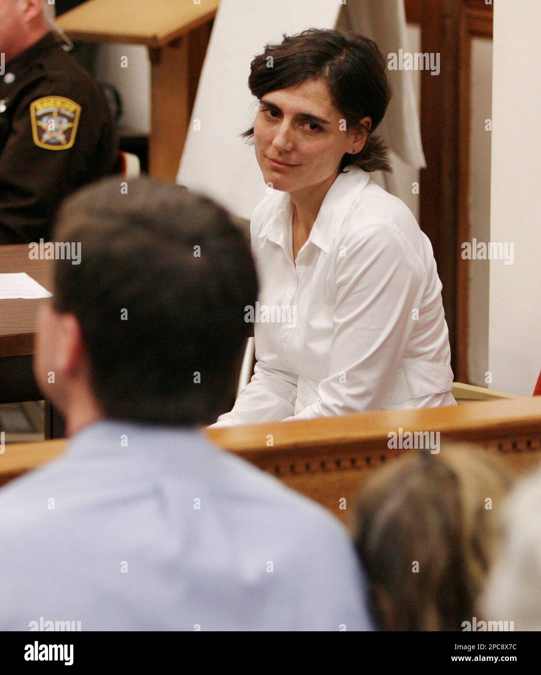 Melanie Cooper looks back at her children in Merrimack County Superior ...