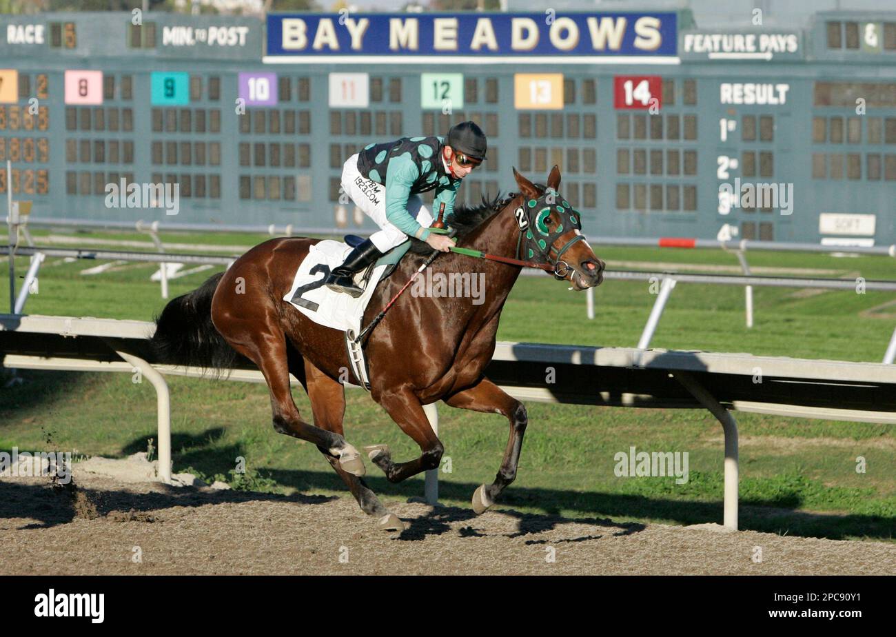 Jockey Russell Baze rides Christie's Fame in the sixth race at Bay ...