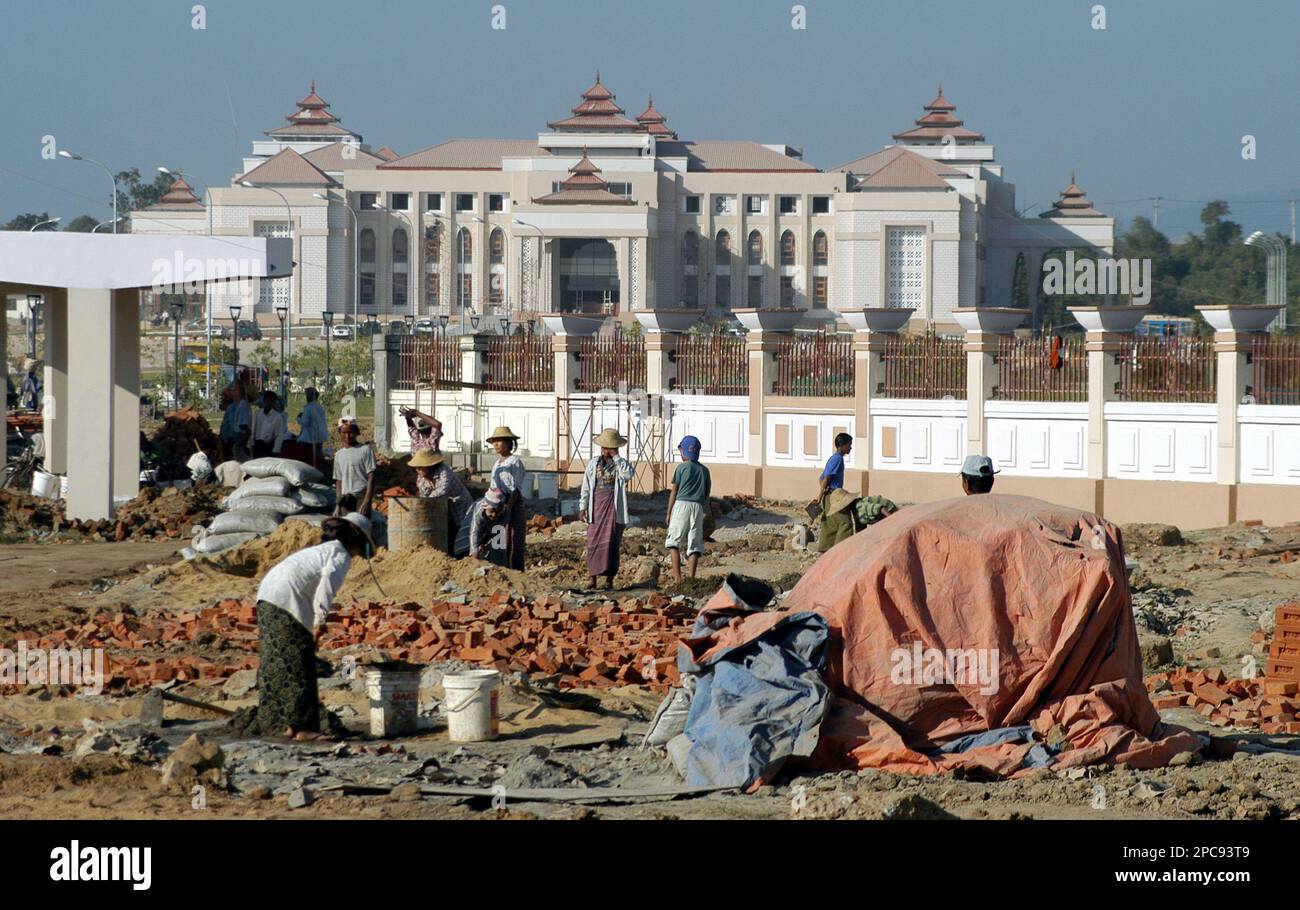 Myanmar labors work at the construction site of the almost finished new ...