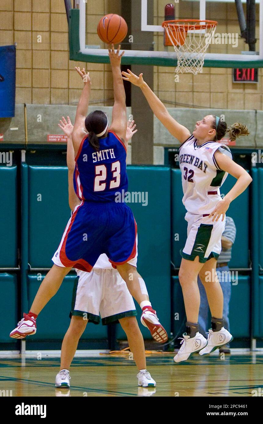 DePaul's Caprice Smith shoots over the defense of Wisconsin - Green Bay ...