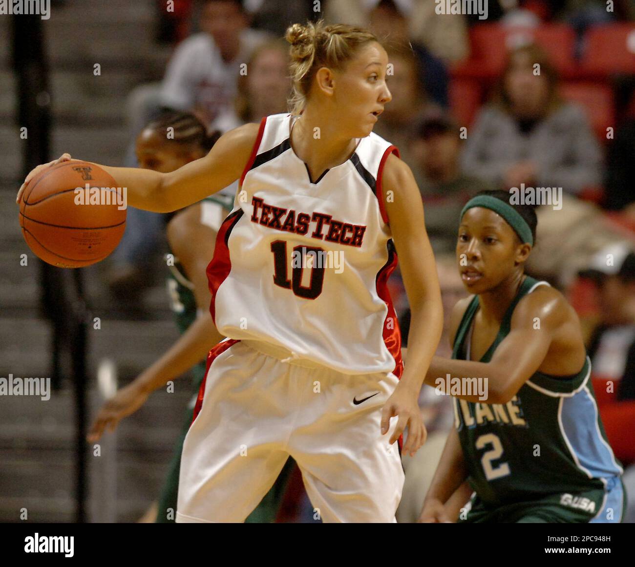 Texas Tech's Brooke Baughman (10) dribbles the basketball against ...