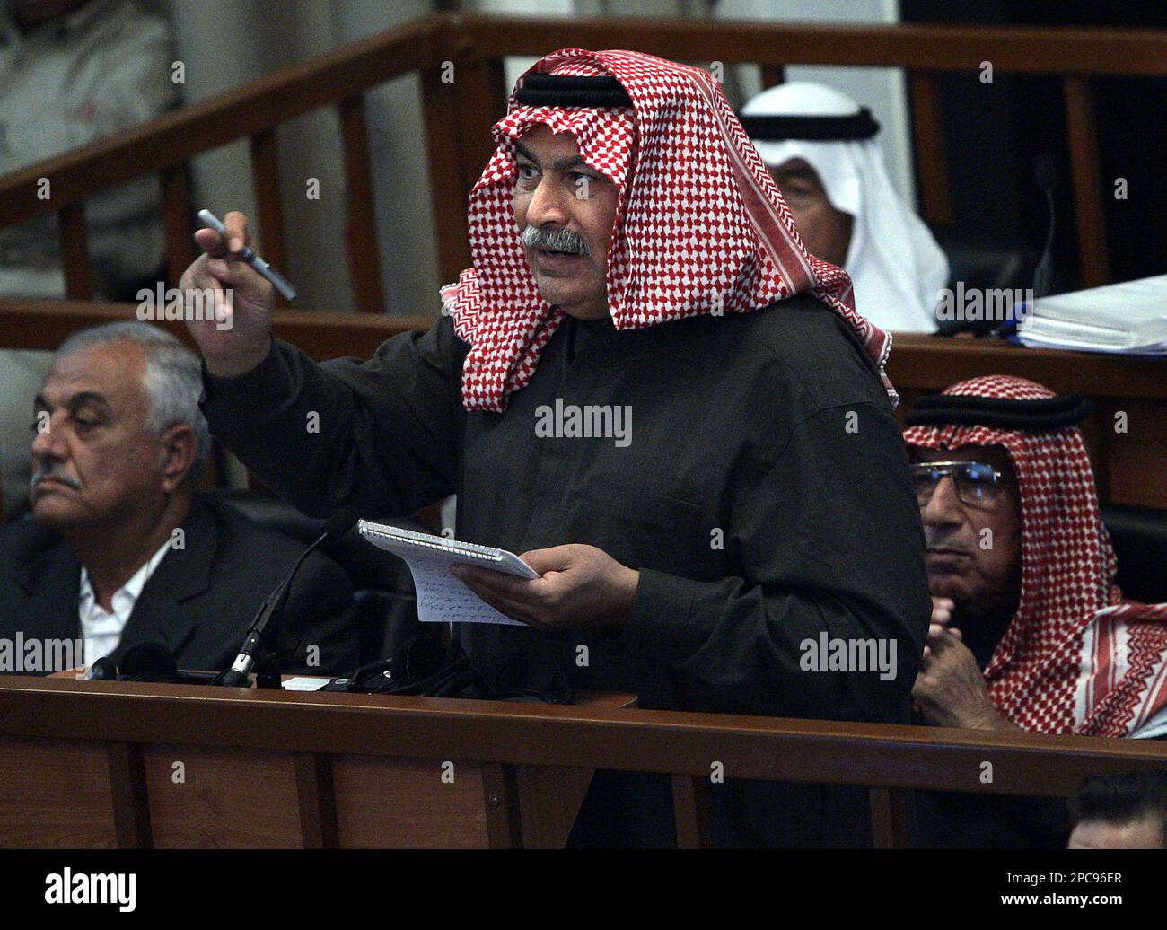 Defendant Sultan Hashim Ahmad al-Tai speaks in court during his resumed ...