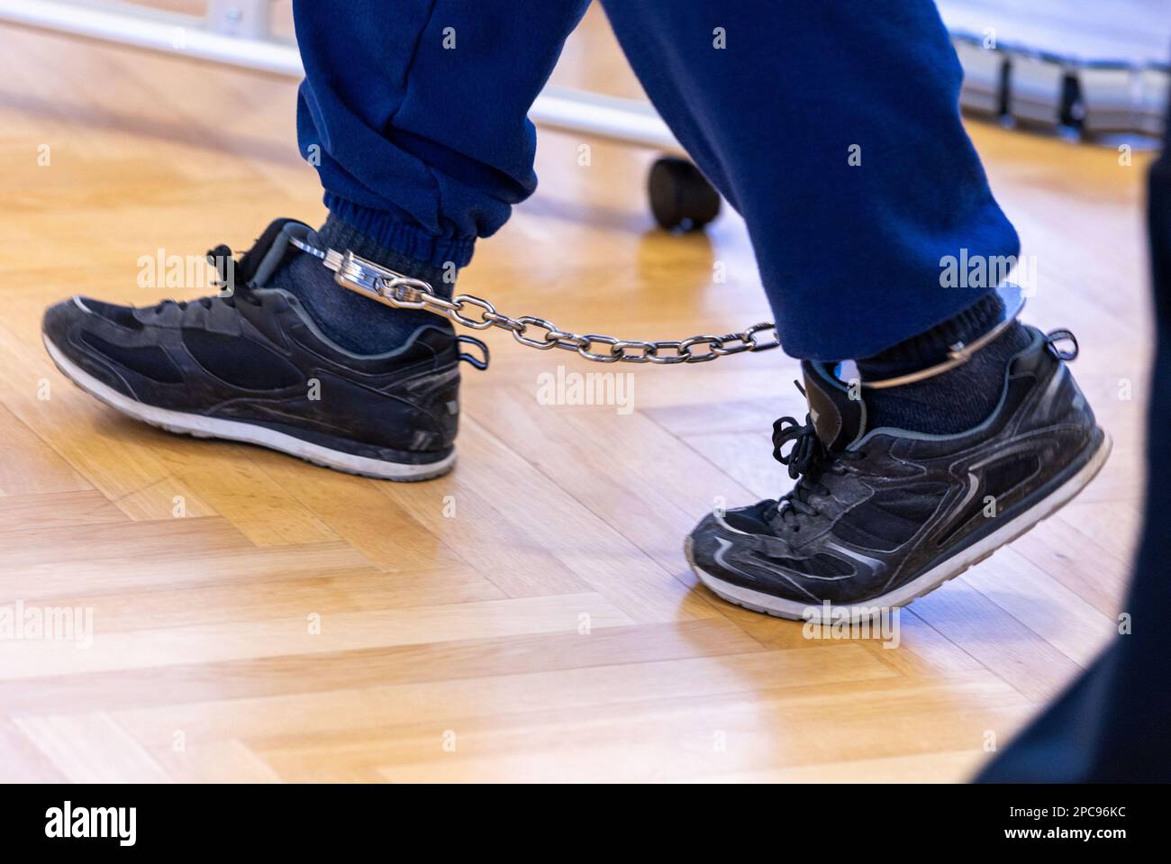 Rostock, Germany. 13th Mar, 2023. The defendant is led to the dock in ...