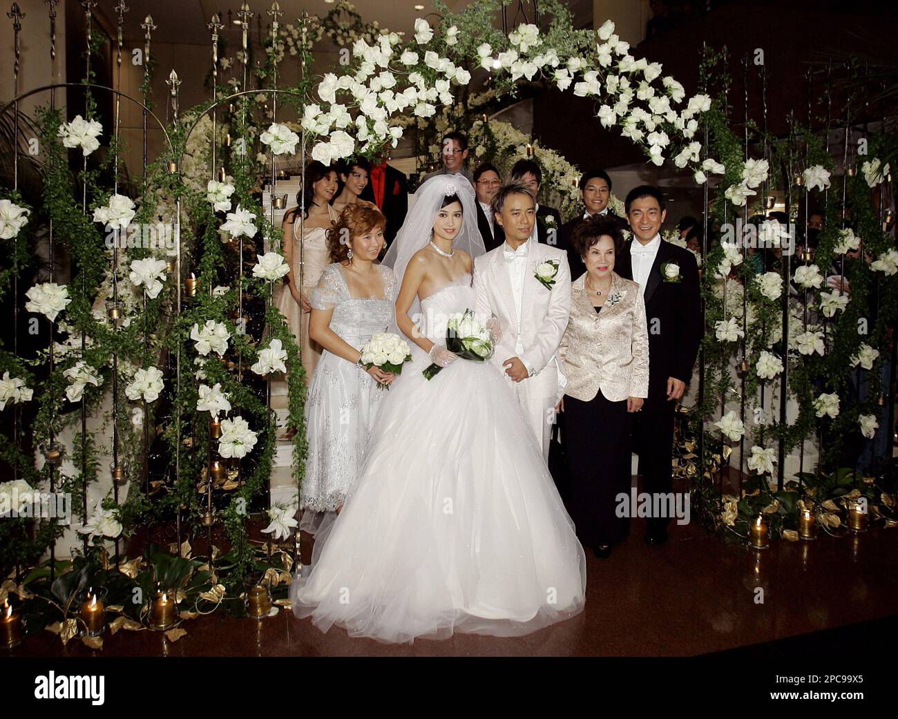 Hong Kong singer-actor Hacken Lee, third from right, poses with his ...