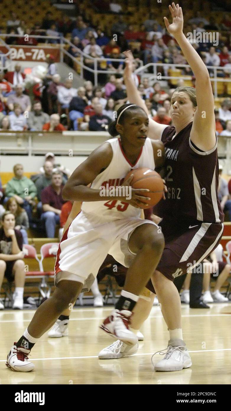 Ohio State's Tamarah Riley, left, drives to the basket against Montana ...