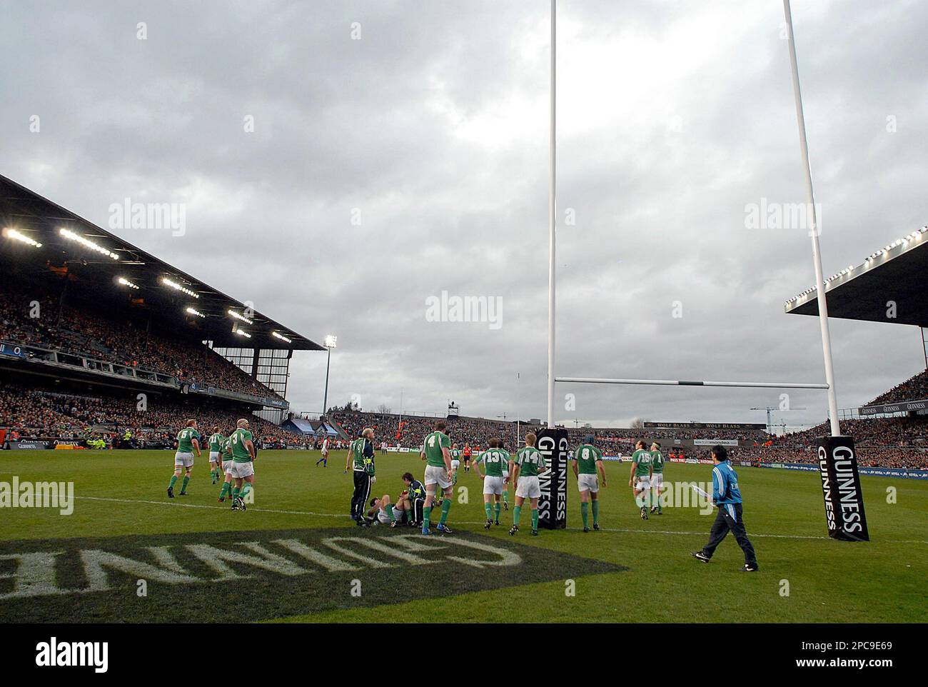 The Irish team watch as the Pacific Islanders score from a conversion ...