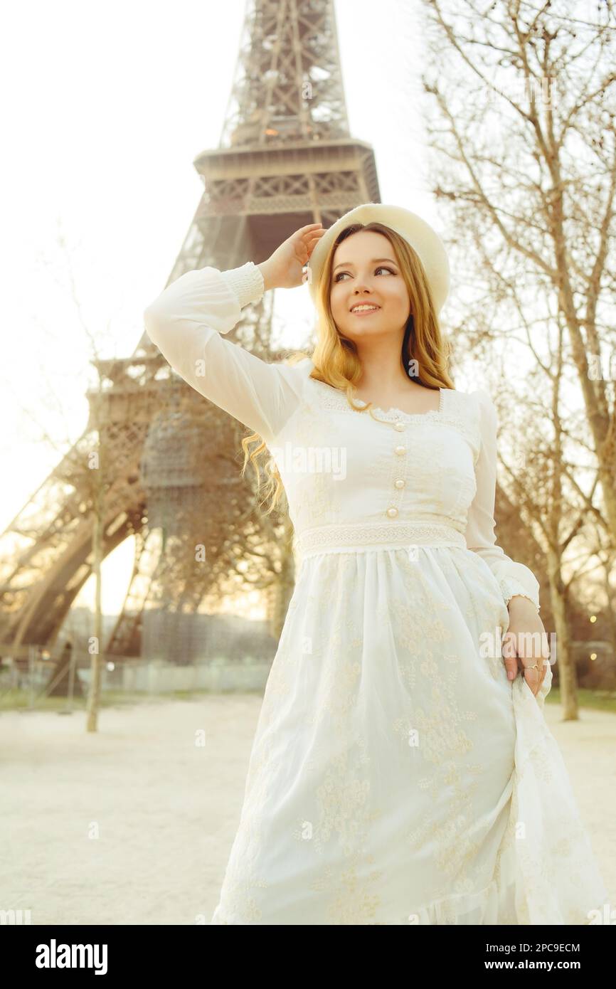 Beautiful girl in Paris, travel and style, blonde in a dress in a ...