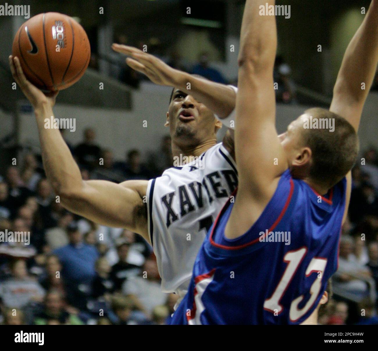 Xavier forward Josh Duncan (1) scores against American center Paulius ...