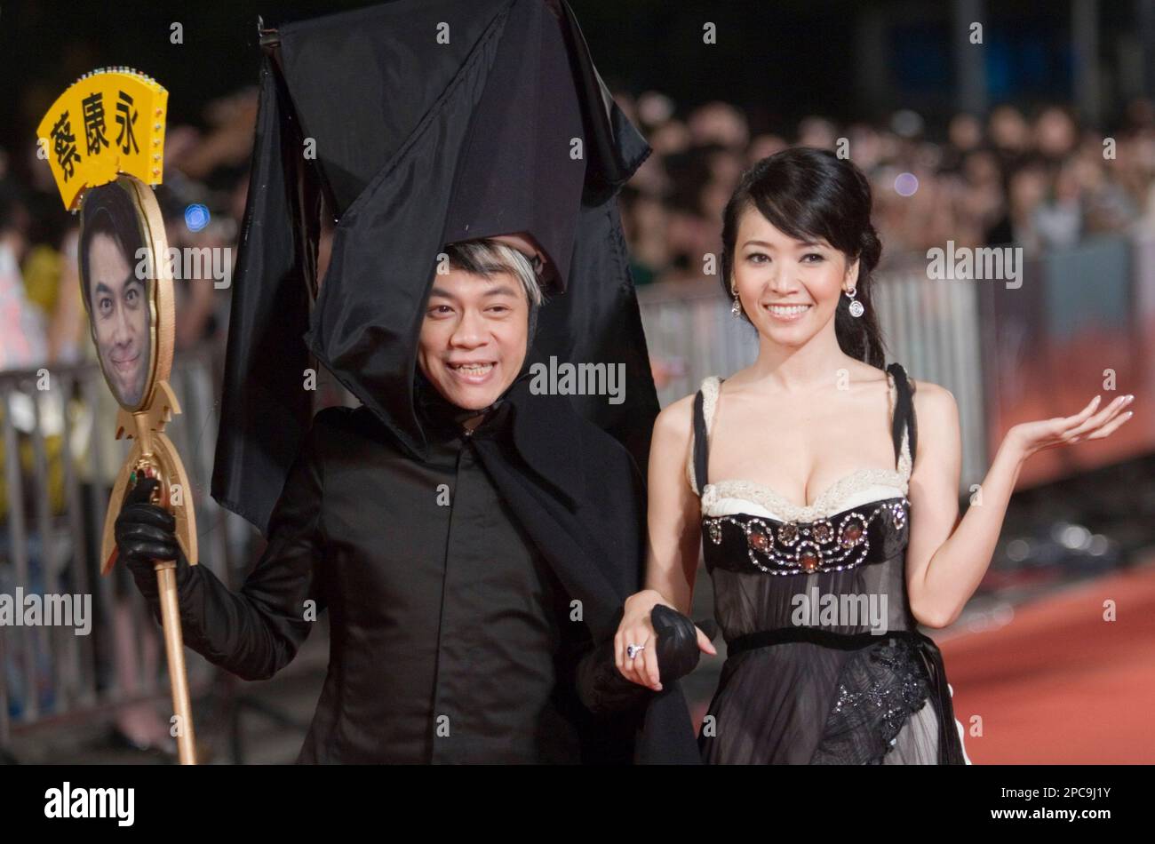Taiwanese TV personality Patty Ho, right, and Kevin Tsai arrive at the 43rd Golden Horse Awards ...