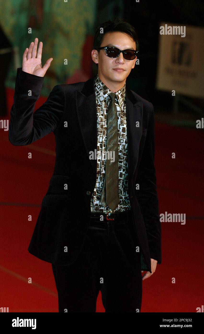 Taiwanese actor Chang Chen smiles as he arrives at the 43rd Golden ...