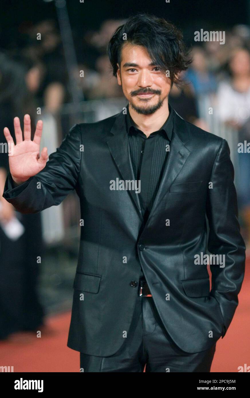 Japanese actor Takeshi Kaneshiro arrives at the 43rd Golden Horse ...