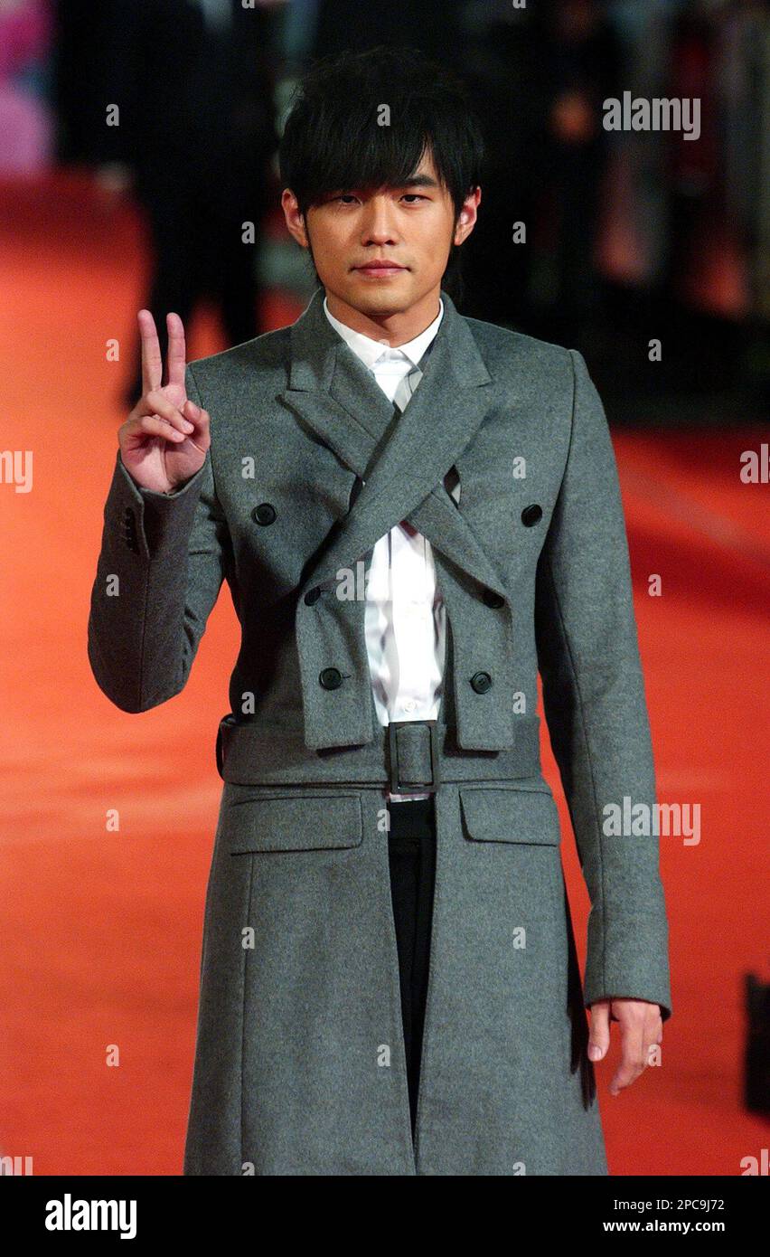 Taiwanese actor Jay Chou gestures as he arrives at the 43rd Golden ...