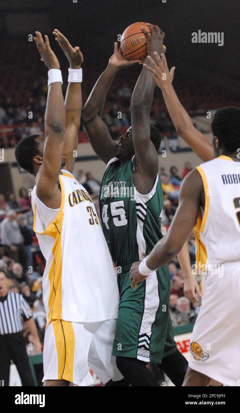 Hawaii's Ahmet Gueye (45) shoots against California's DeVon Hardin ...