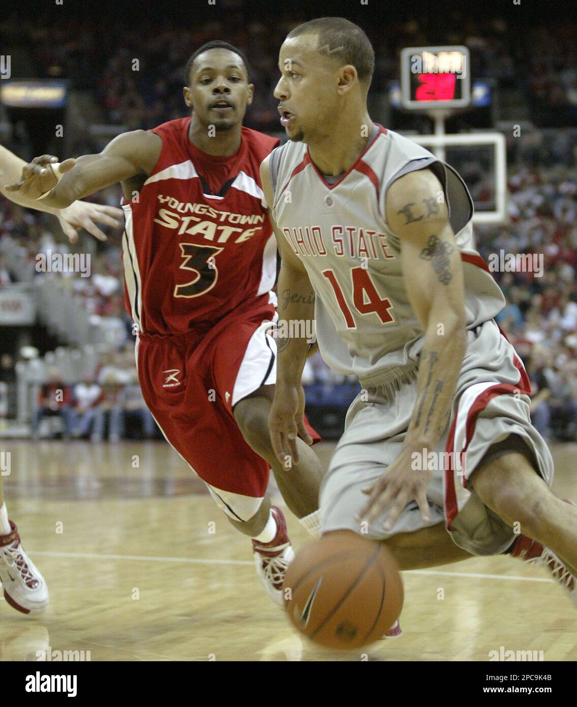 Ohio State's Jamar Butler, right, drives past Youngstown State's Byron ...