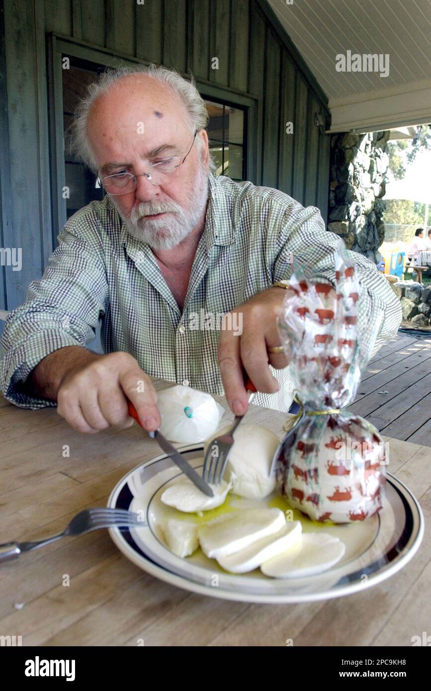 Hanns Michael Heick, owner of Bubalus Bubalis, Inc., samples mozzarella ...