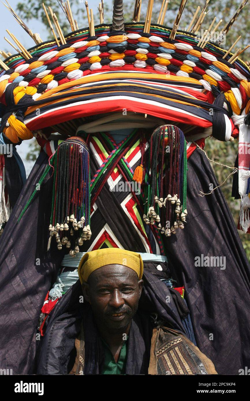A Nigerian dancer performs at a carnival in Abuja, Nigeria, Friday, Nov ...