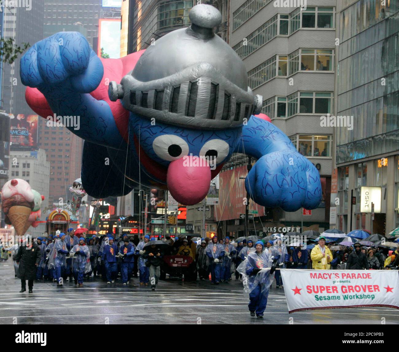 The Super Grover balloon moves down Seventh Ave. during the Macy's ...