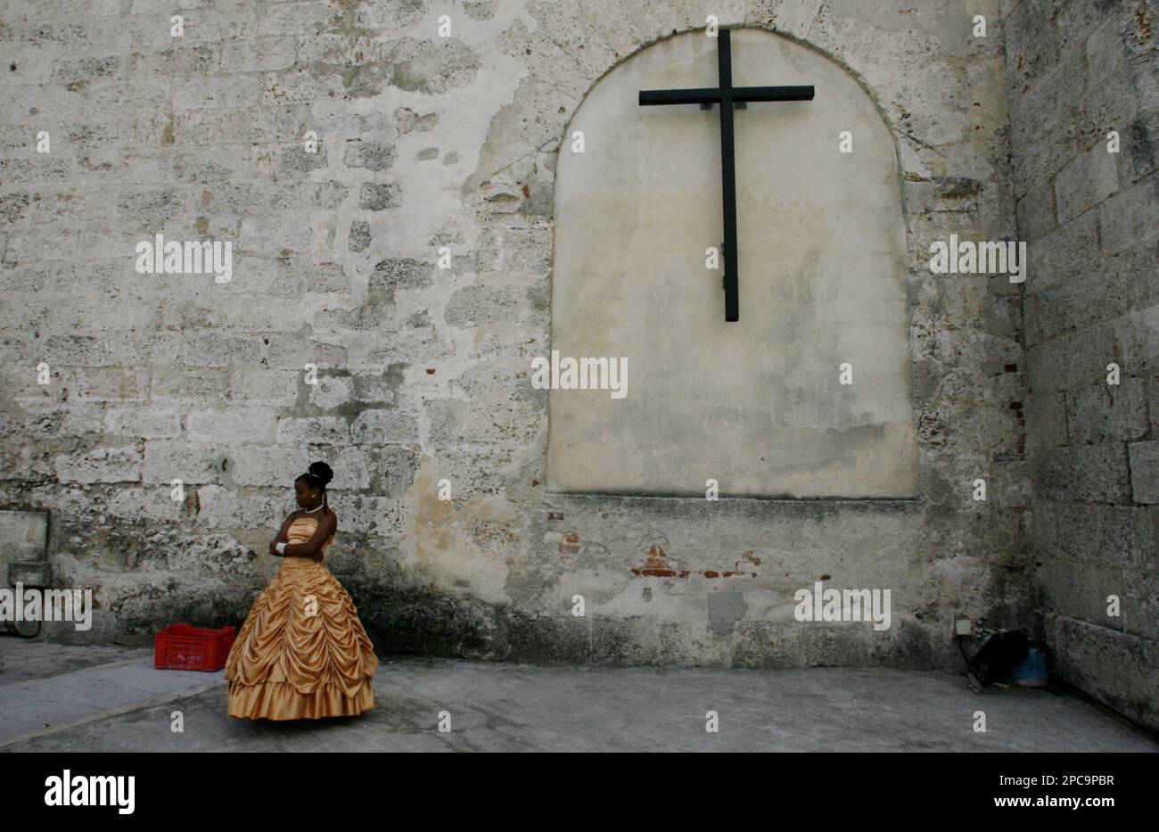 A unidentified girl is seen waiting for her photo session outside of ...