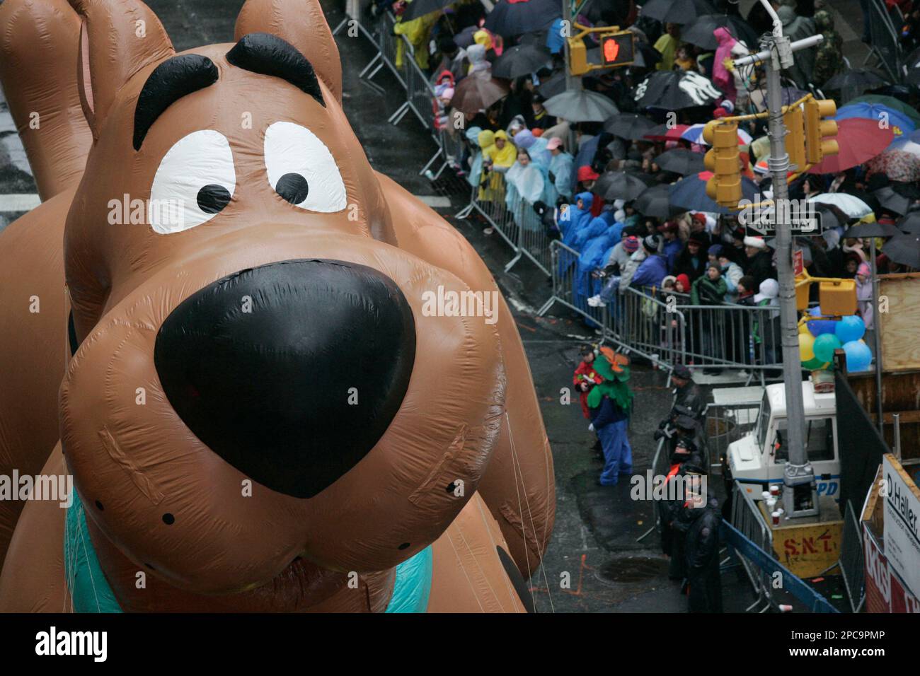 The Scooby Doo balloon floats down Broadway in the rain during the Macy ...