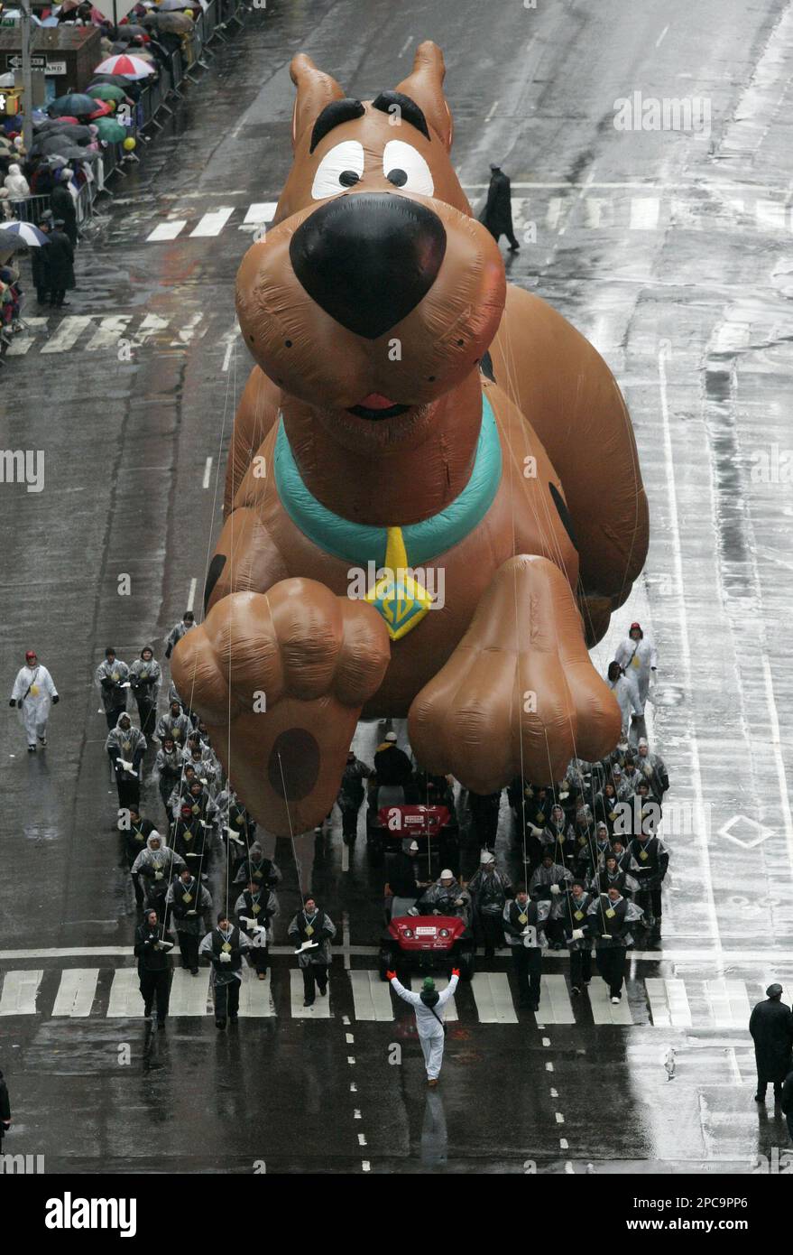 The Scooby Doo balloon floats down Broadway in the rain during the Macy ...