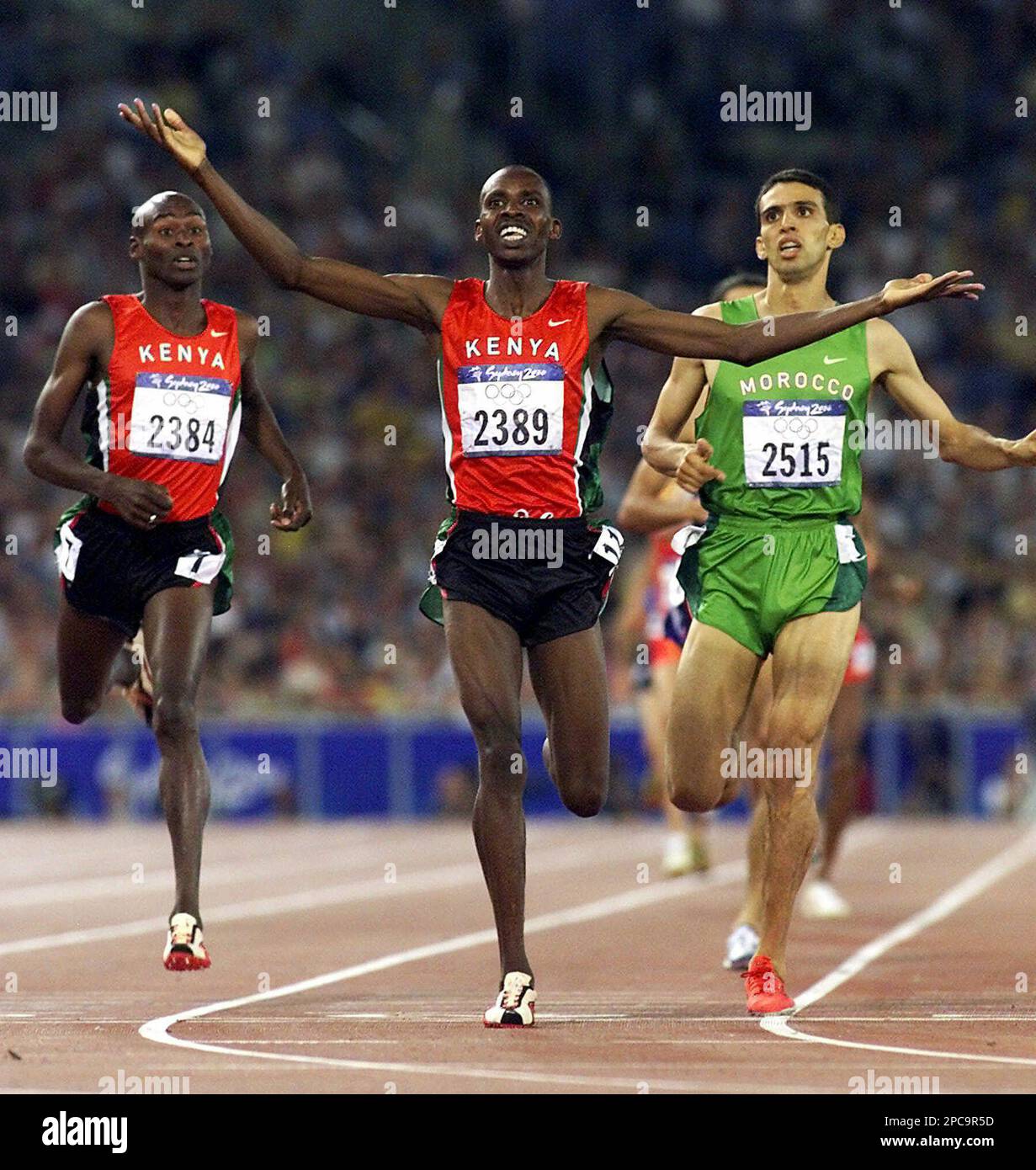 ** FILE ** Kenya's Noah Ngeny, center, wins the gold medal in the men's ...