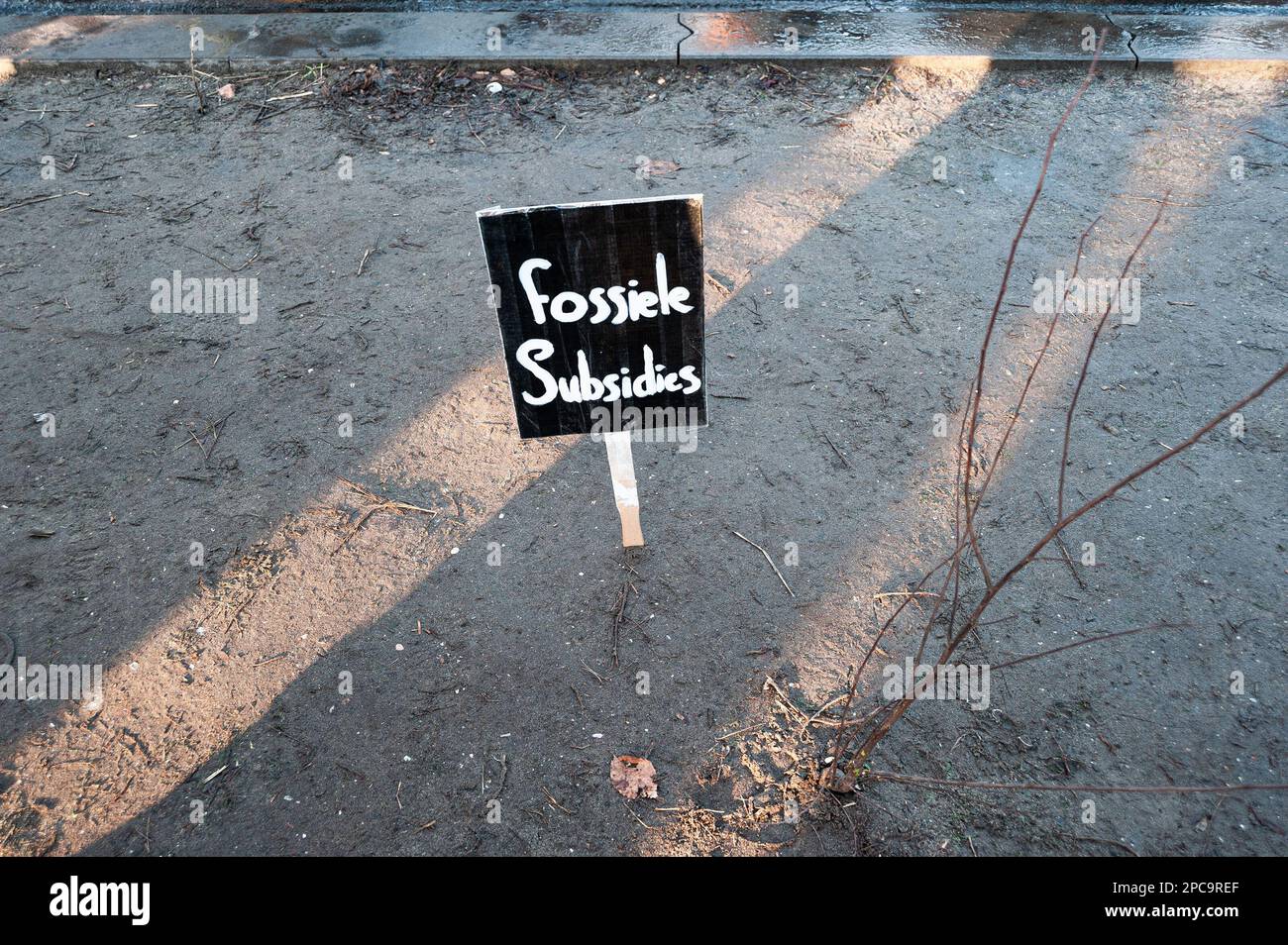 A ‘Fossil Subsidies' sign seen during the demonstration. Extinction ...