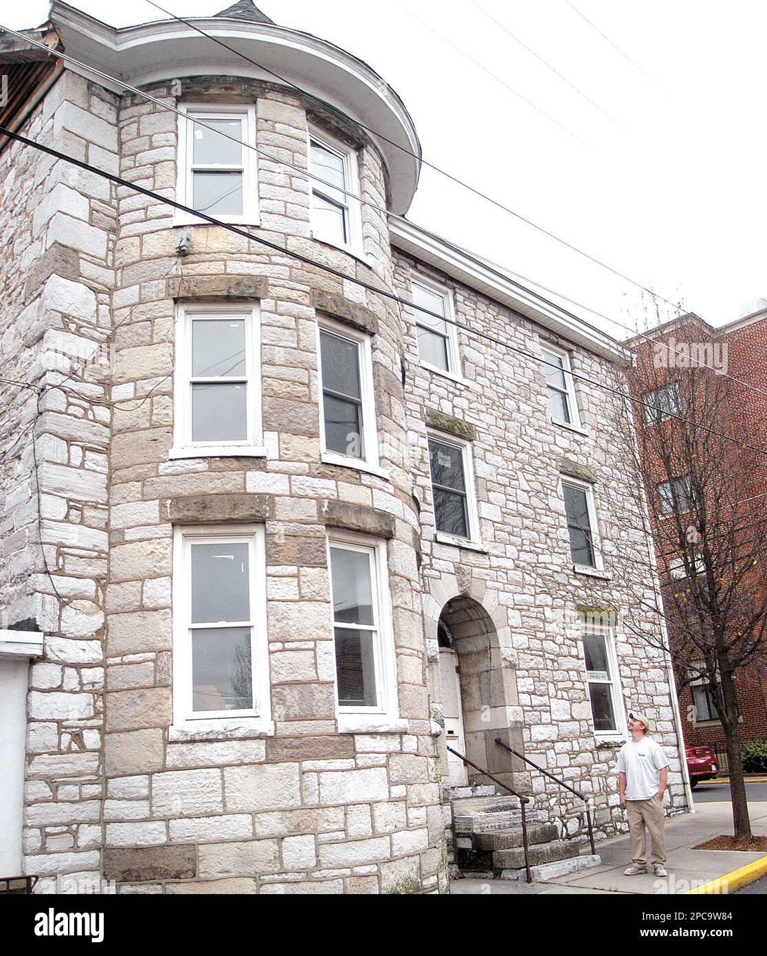 James Van Metre, stands in front of the historic house he recently ...