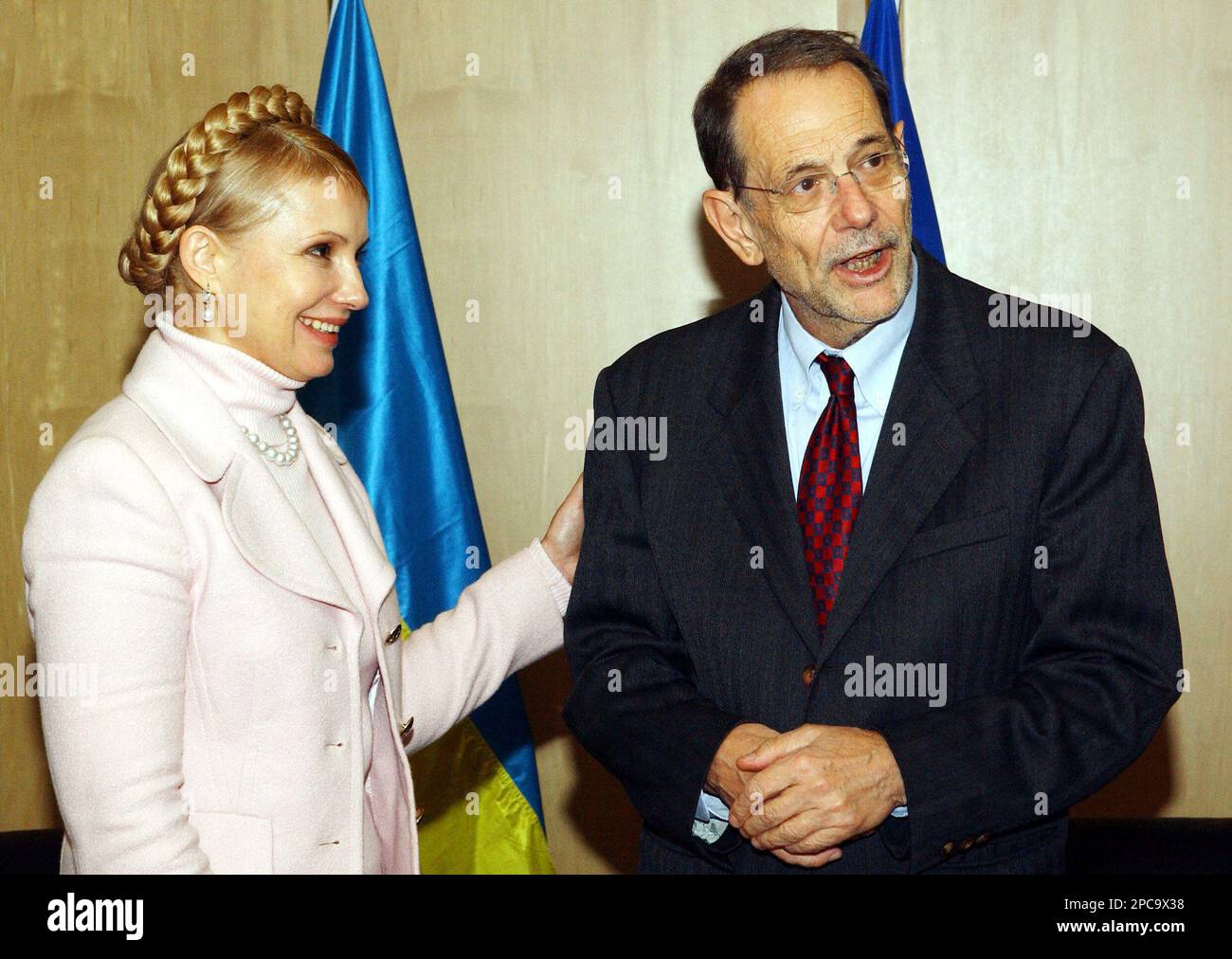 EU foreign affairs chief Javier Solana, right, talks to the media prior ...