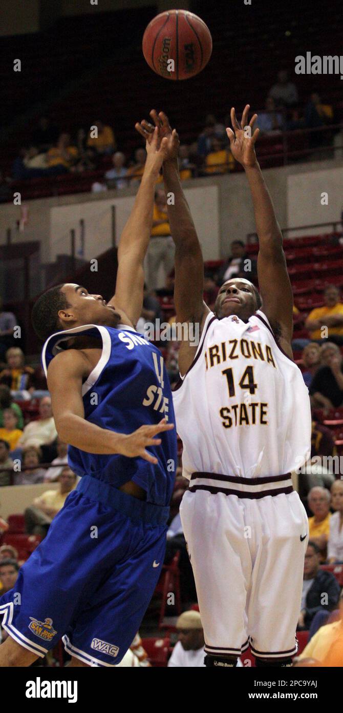 San Jose State guard Darion Goins, left, is unable to stop the 3-point ...