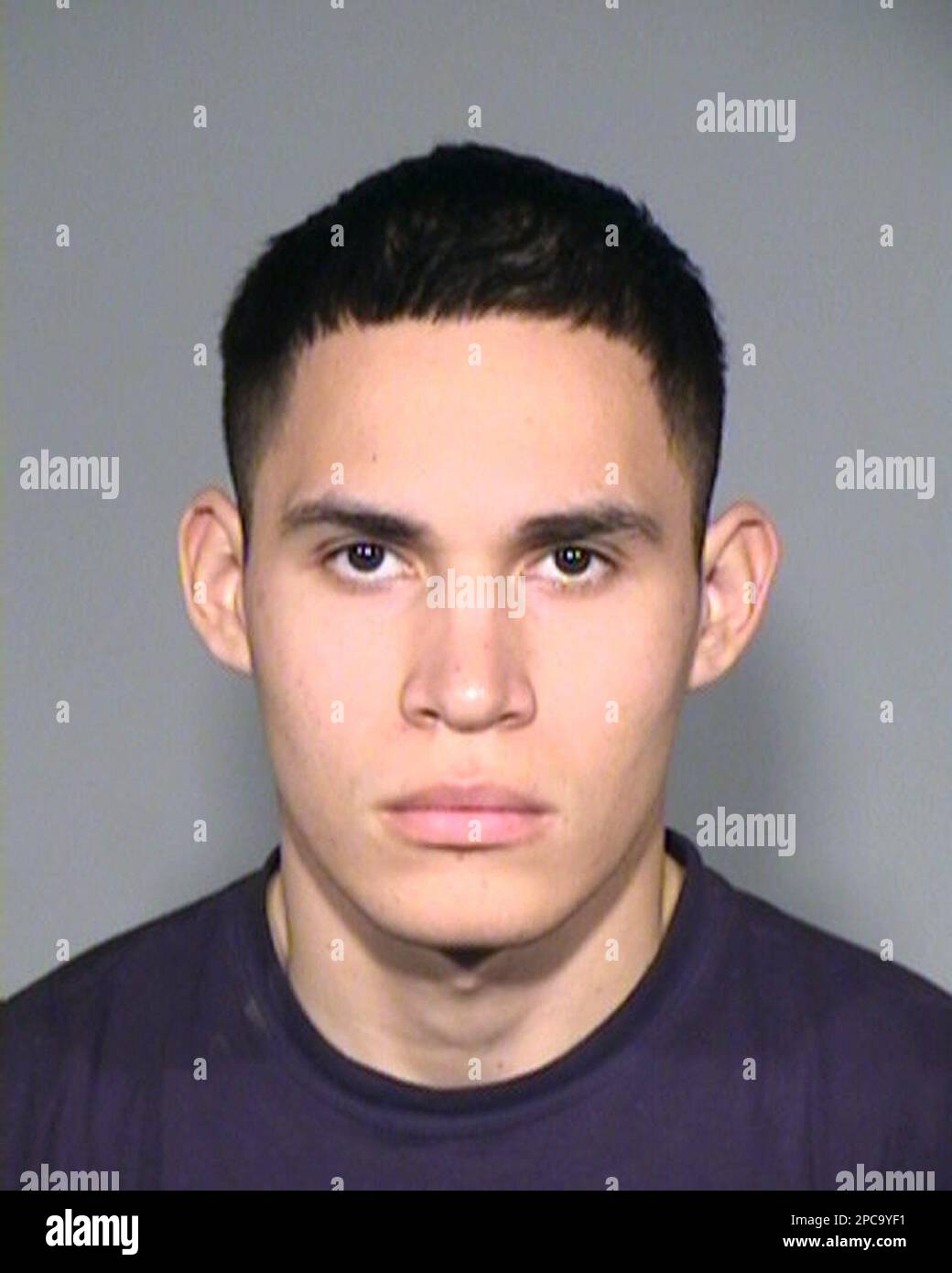 In this undated photo released by the Fresno Police, Robert Quiroz is ...