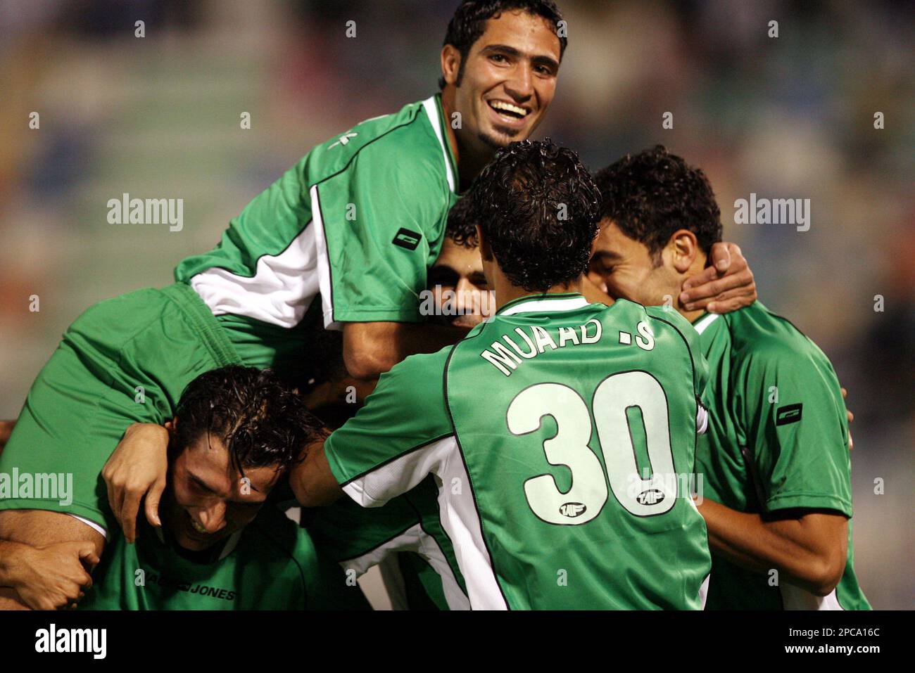 Iraqi players celebrate their victory during their Asian Games ...