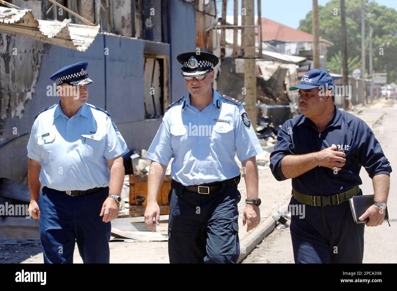 New Zealand Police Superintendent Brett England, left, Australian ...