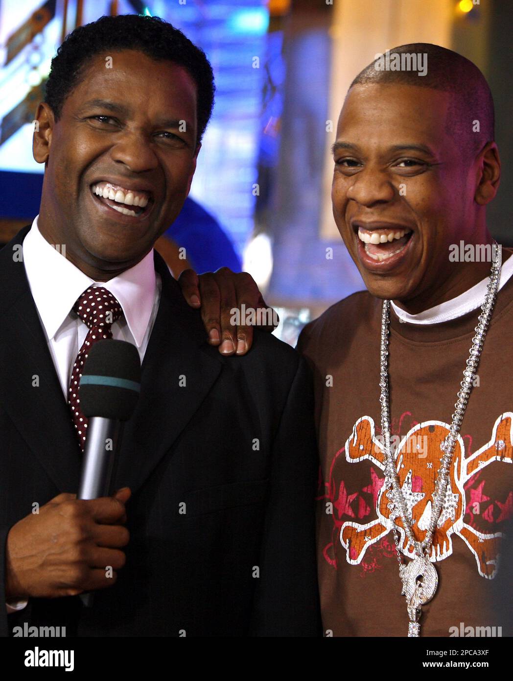 Actor Denzel Washington, left, and rapper Jay-Z appear onstage during ...