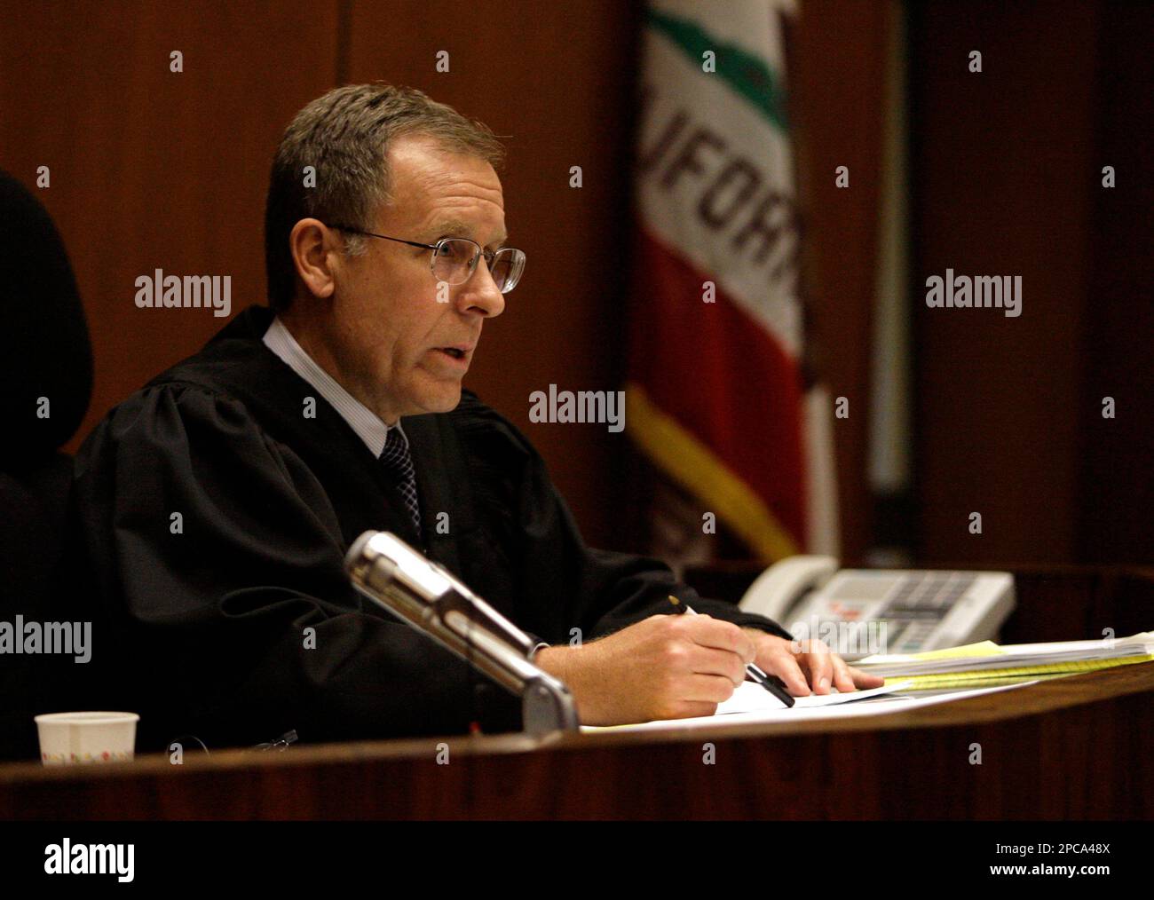 Judge Michael Johnson delivers a probation sentence to George Russell ...